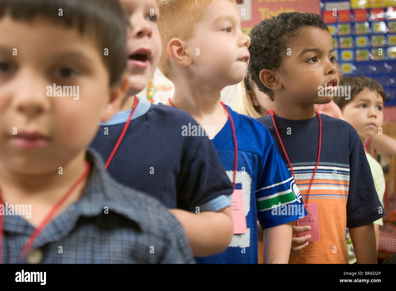 Young boys in a line at preschool Stock Photo - Alamy