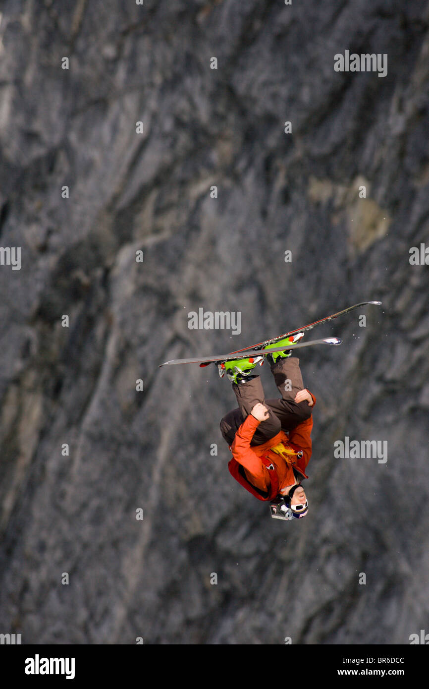 A male Ski BASE jumper jumps off an 800 foot granite cliff Stock Photo ...