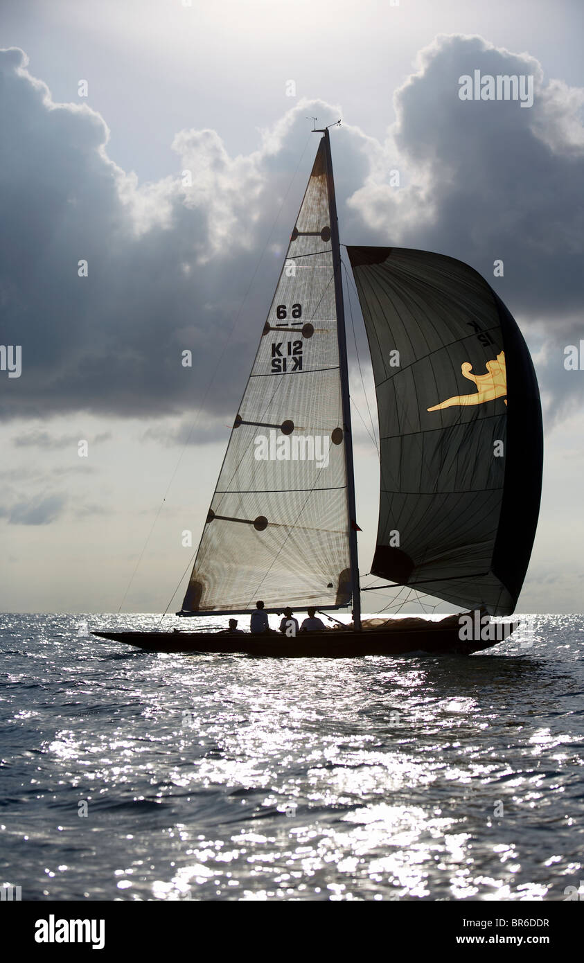 Sailing downwind at sunset Stock Photo - Alamy