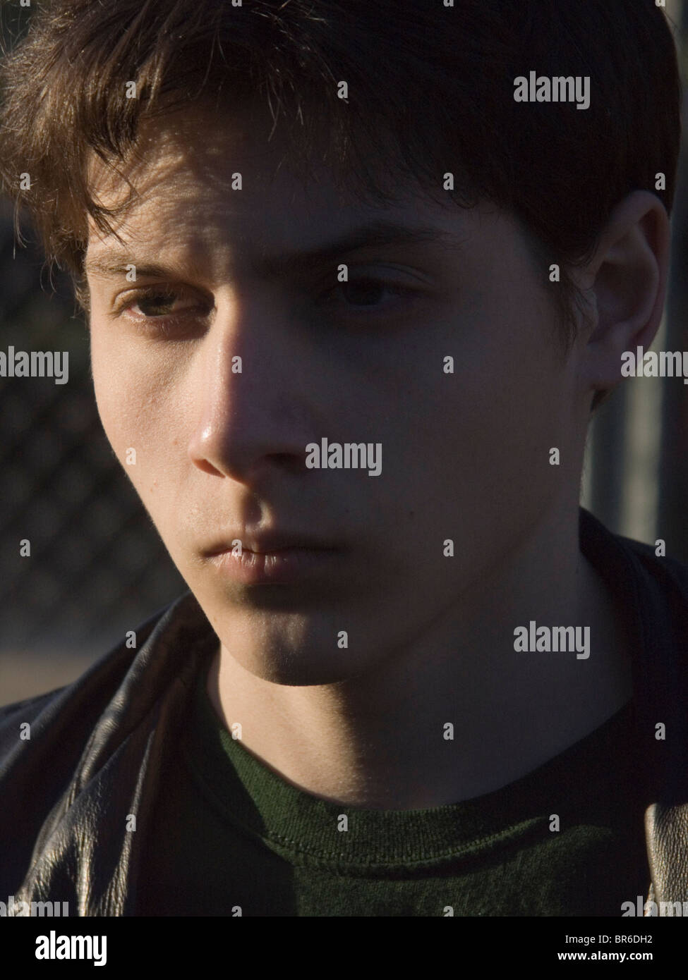 Portrait of a man in harsh light in Los Osos California. (side lit ...