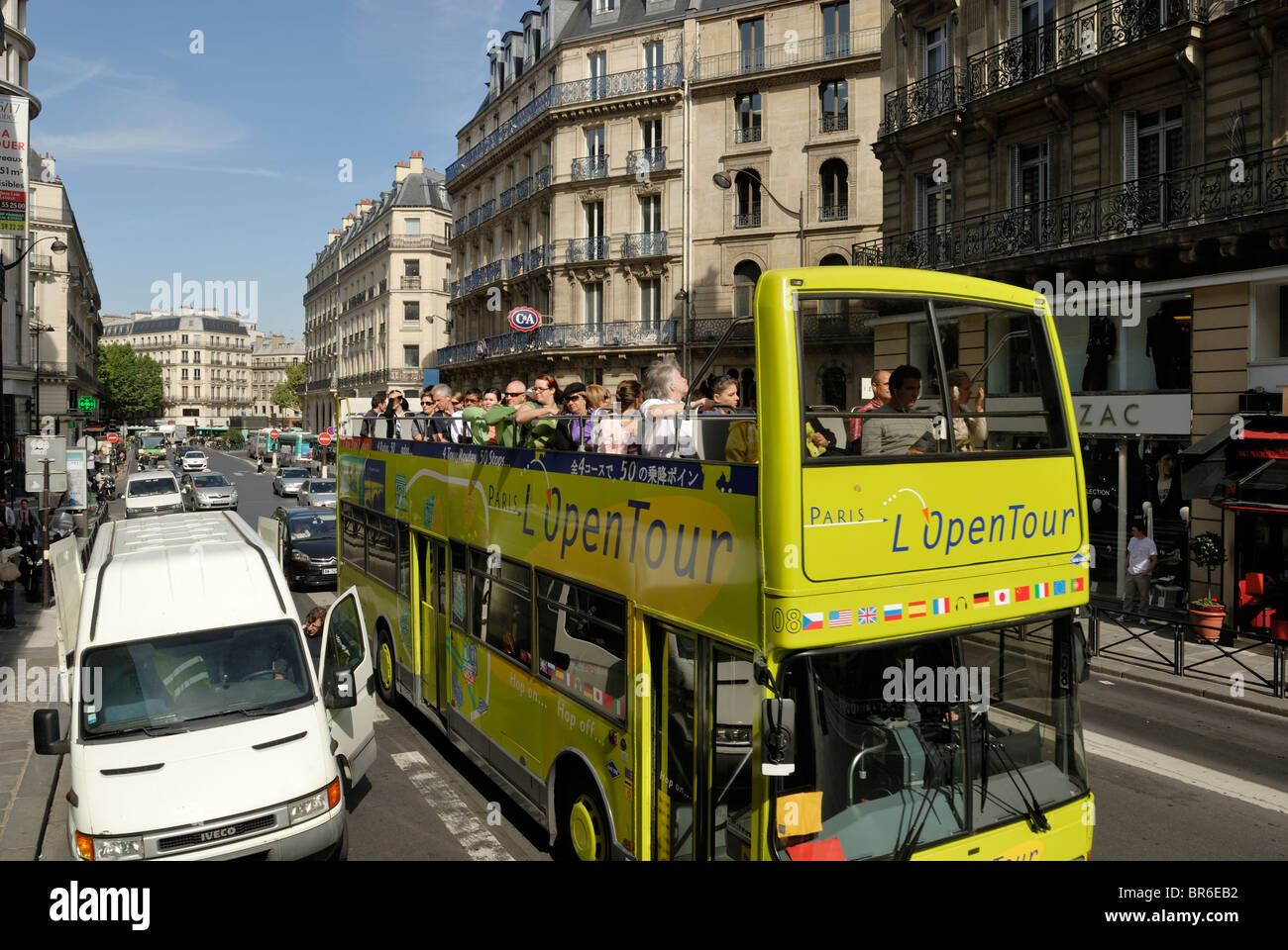 Packed tour bus on the busy city streets of Paris, France Stock Photo ...