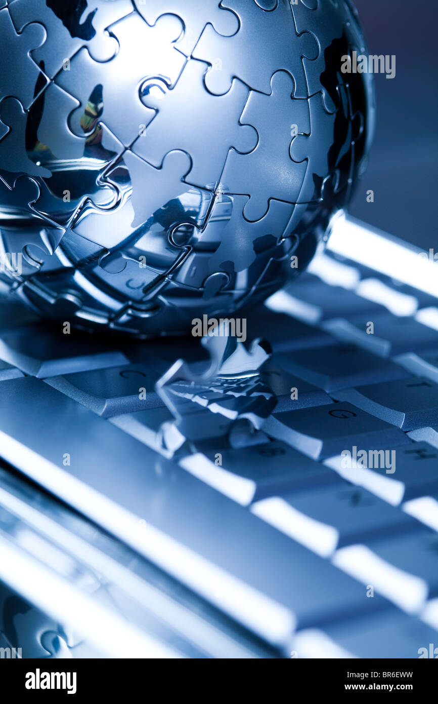 Globe and computer Stock Photo - Alamy