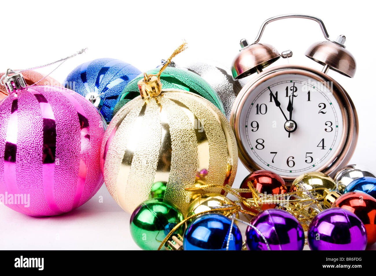 Alarm clock and christmas decorations on a white background-Christmas ...
