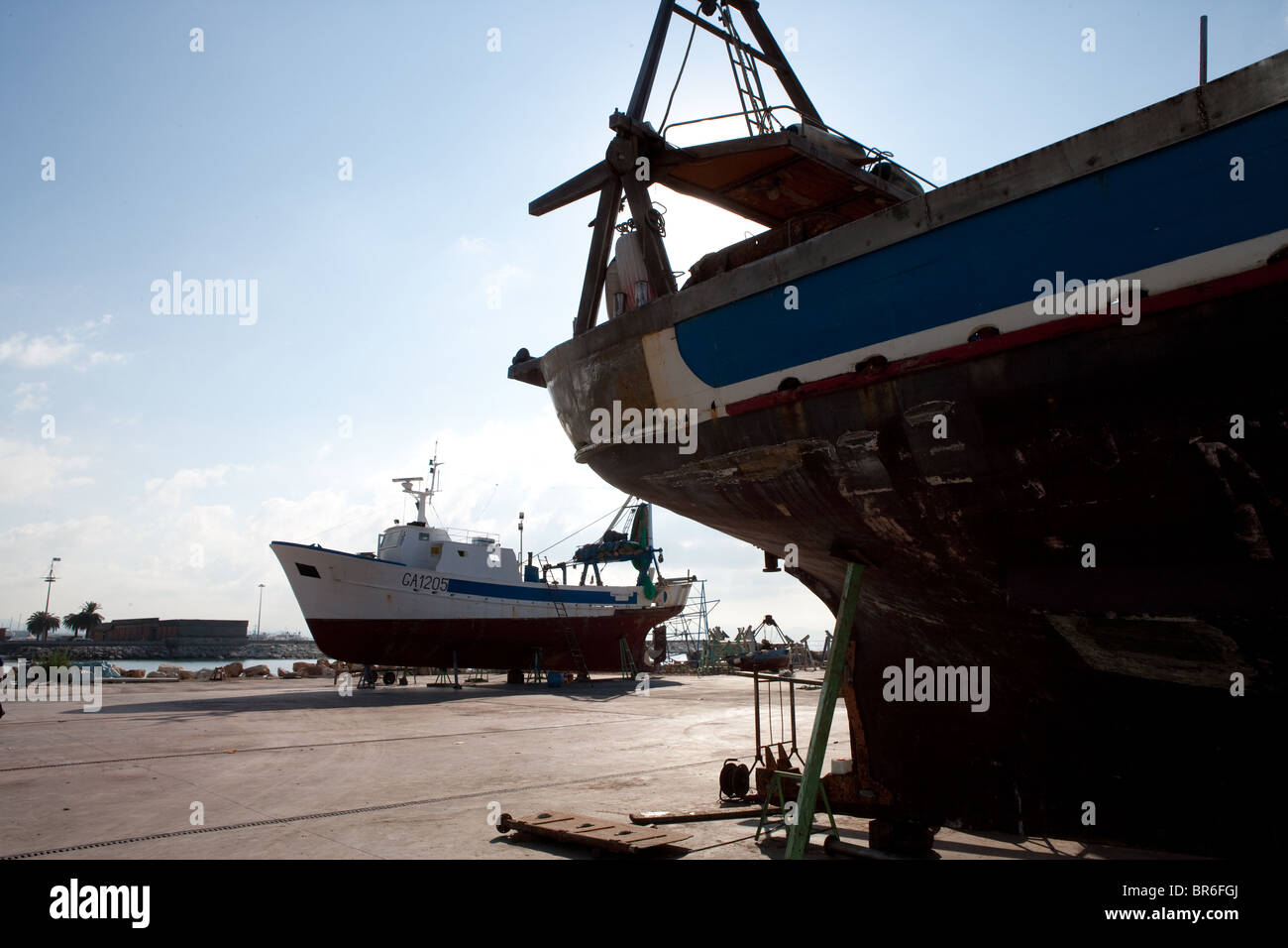Fishing boats trawlers in shipyard Mediterranean sea Italy Stock Photo ...