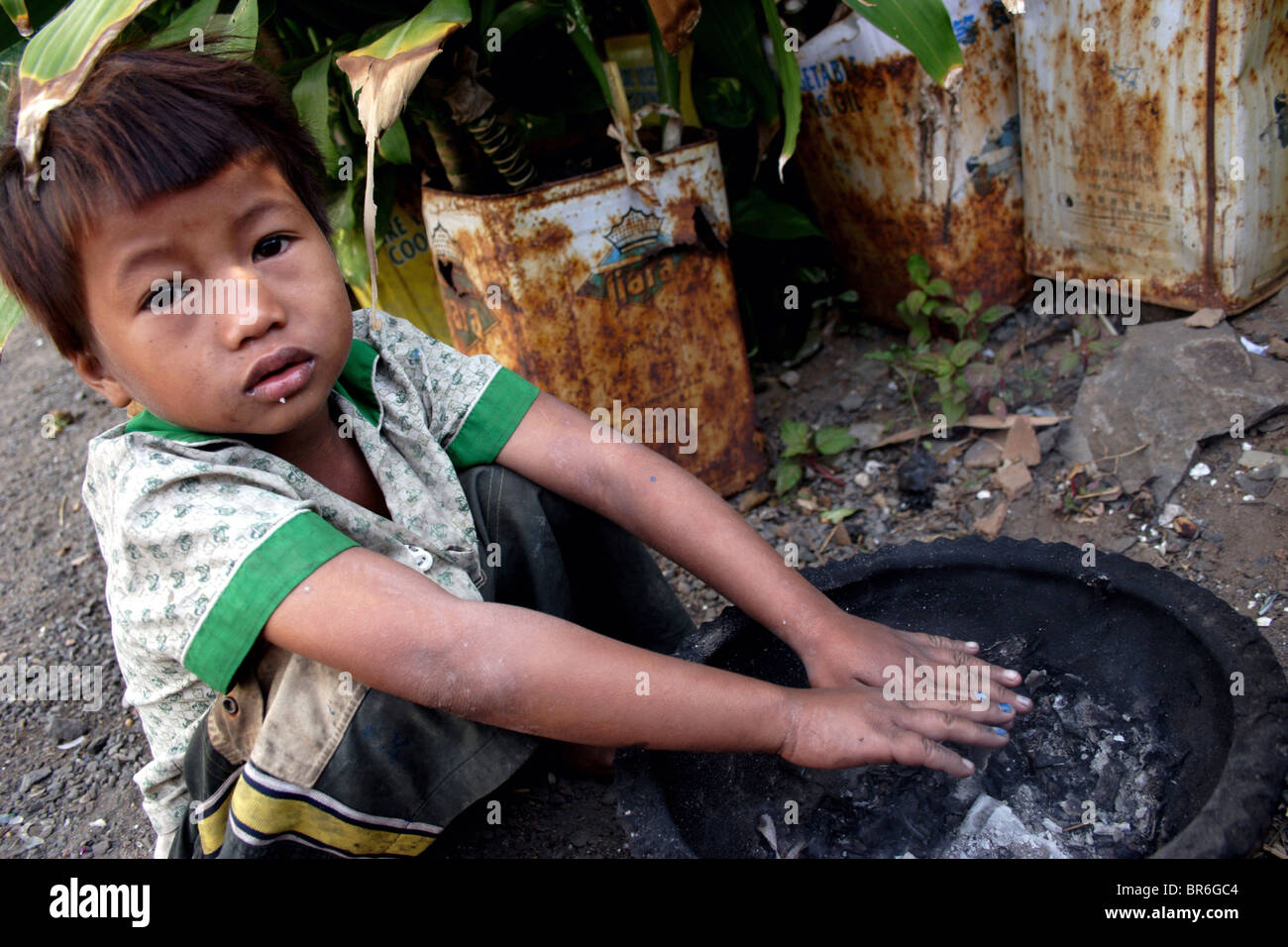 A young boy who lives in a squatter's shack with his family of six ...