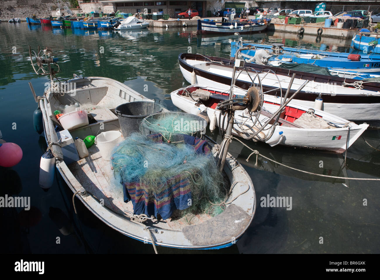 Little fishing boats in small harbor Mediterranean sea Formia Campania ...