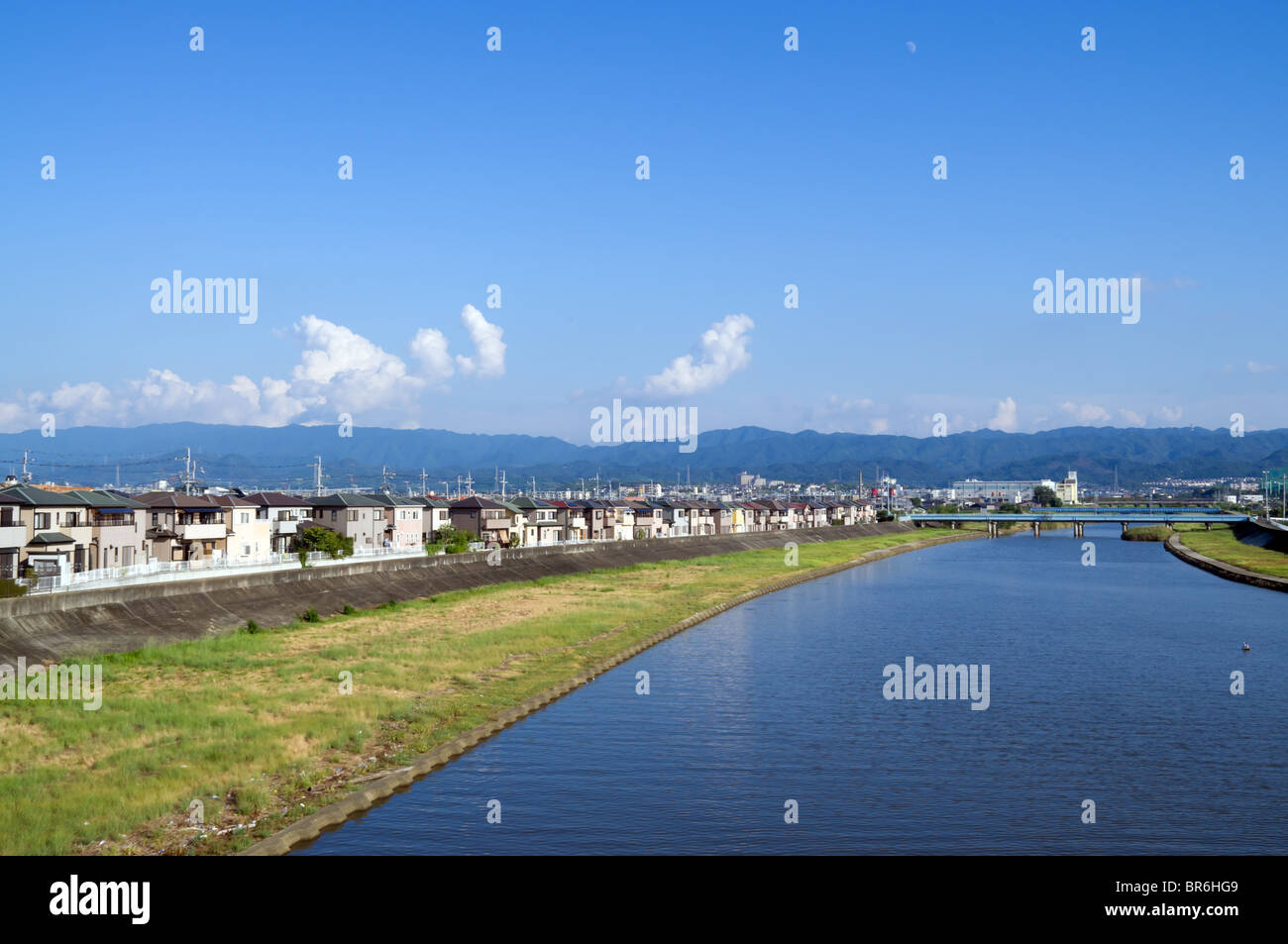 A view of the river past rows of houses in the Sennan District near ...