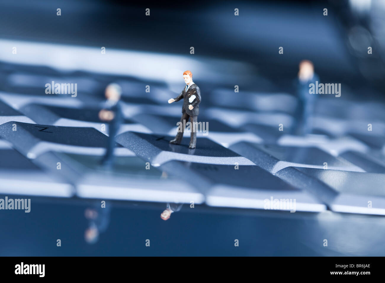 Figure man over computer background Stock Photo - Alamy