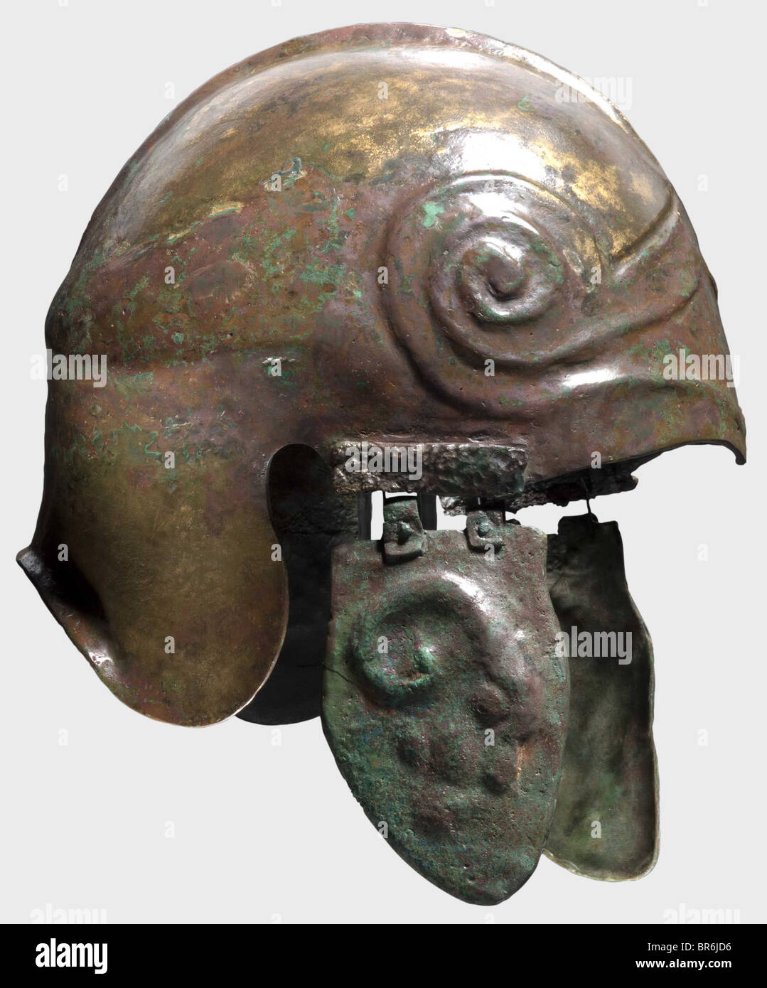 A Chalcidian helmet with cheek pieces, 5th/4th century B.C. Bronze ...