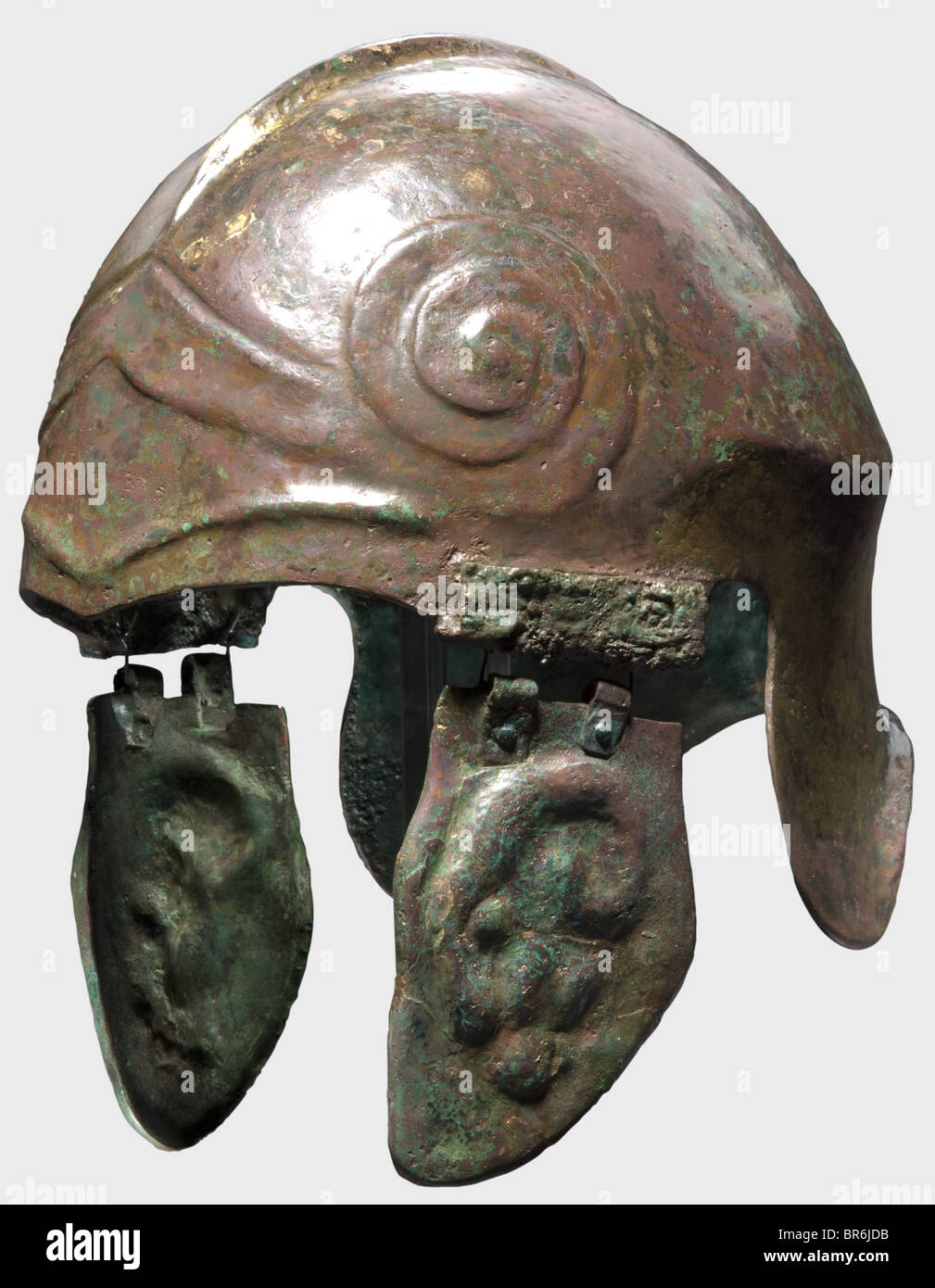 A Chalcidian helmet with cheek pieces, 5th/4th century B.C. Bronze ...
