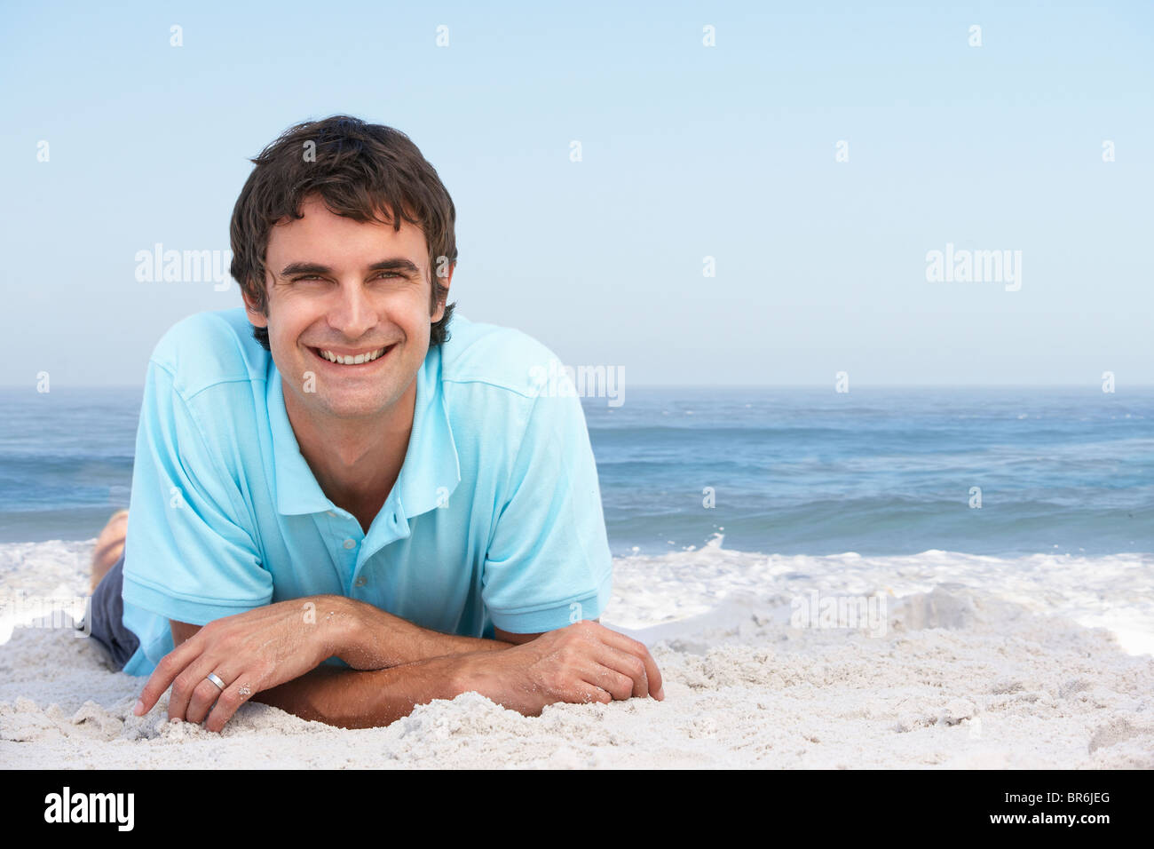 Man relaxing on the shore hi-res stock photography and images - Alamy