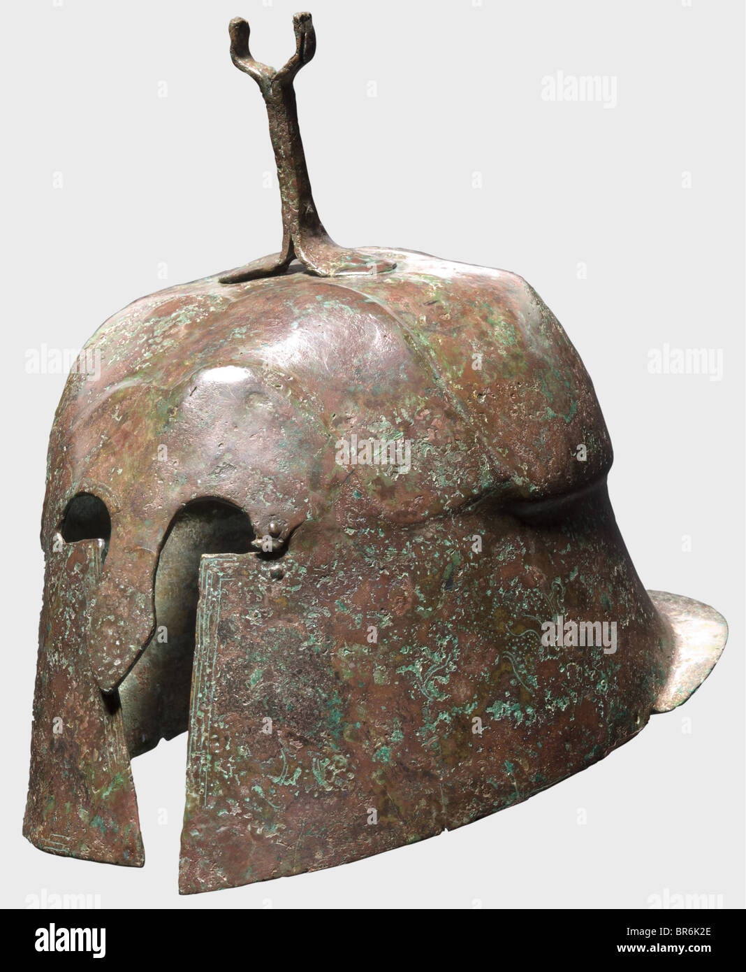 An Apulian-Corinthian helmet, 5th century B.C. Offset skull with ...