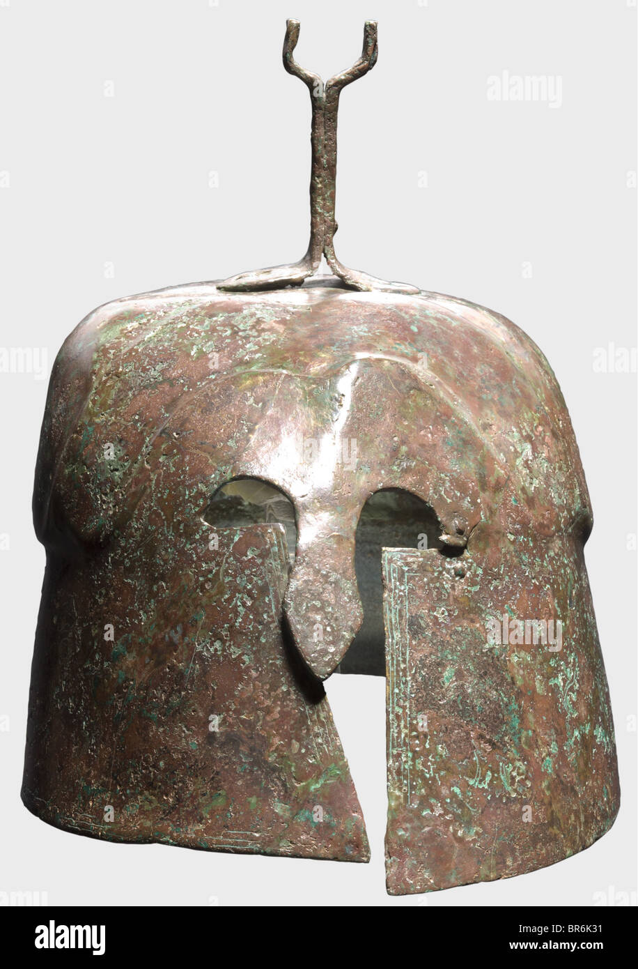 An Apulian-Corinthian helmet, 5th century B.C. Offset skull with ...