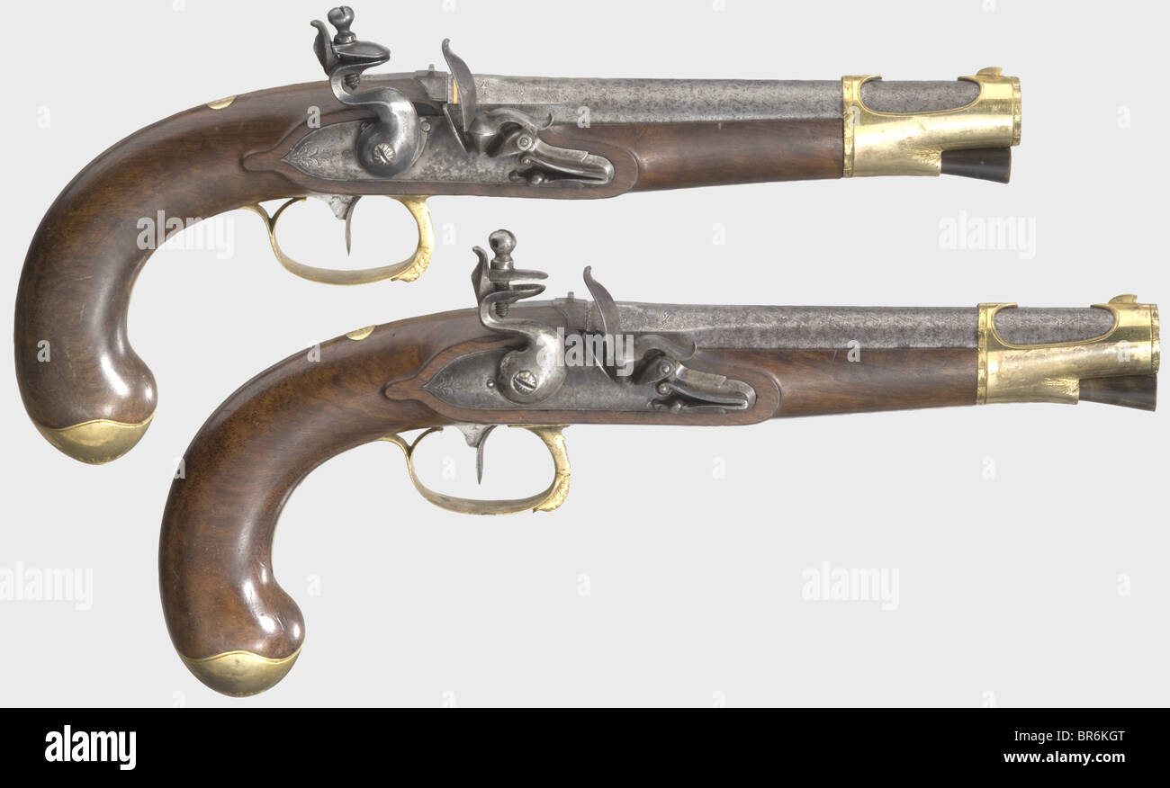 A cased pair of officer's flintlock pistols, Russia, dated 1831. Round ...