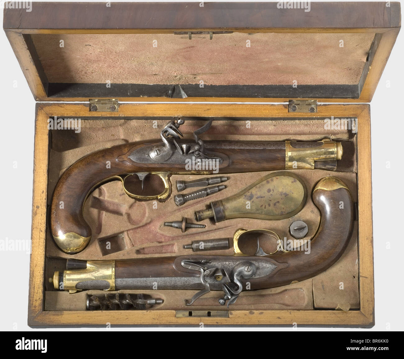 A cased pair of officer's flintlock pistols, Russia, dated 1831. Round ...