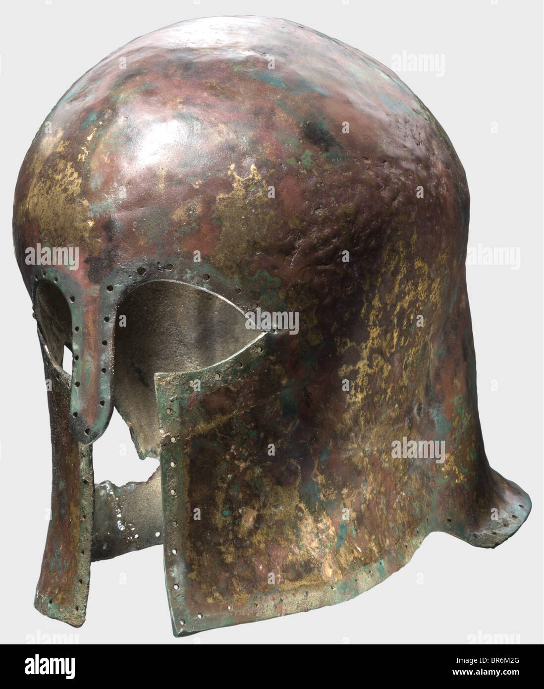 A Corinthian helmet, 6th century B.C. Bronze. Heavy, long stretched ...