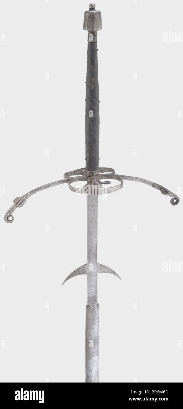 A German two-handed sword, circa 1580. Double-edged blade of lenticular ...