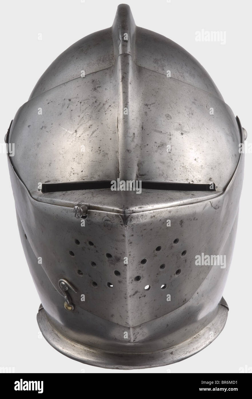 A German close helmet, circa 1570/80. Skull made in two pieces with a ...