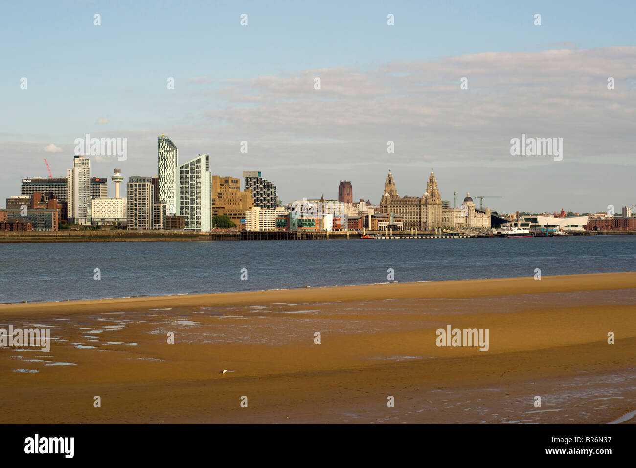 The River Mersey from the Wirral with The Royal Liver Buildings in the ...