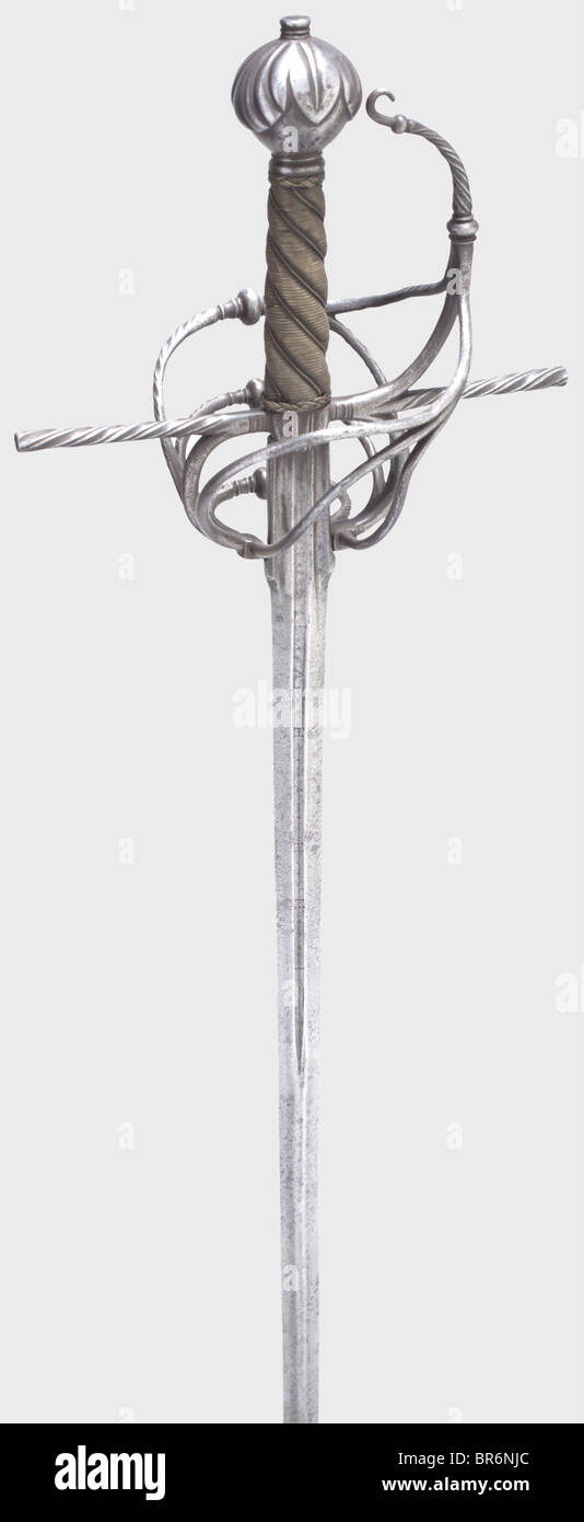 An Italian rapier, circa 1600. Slender thrusting blade of flattened ...