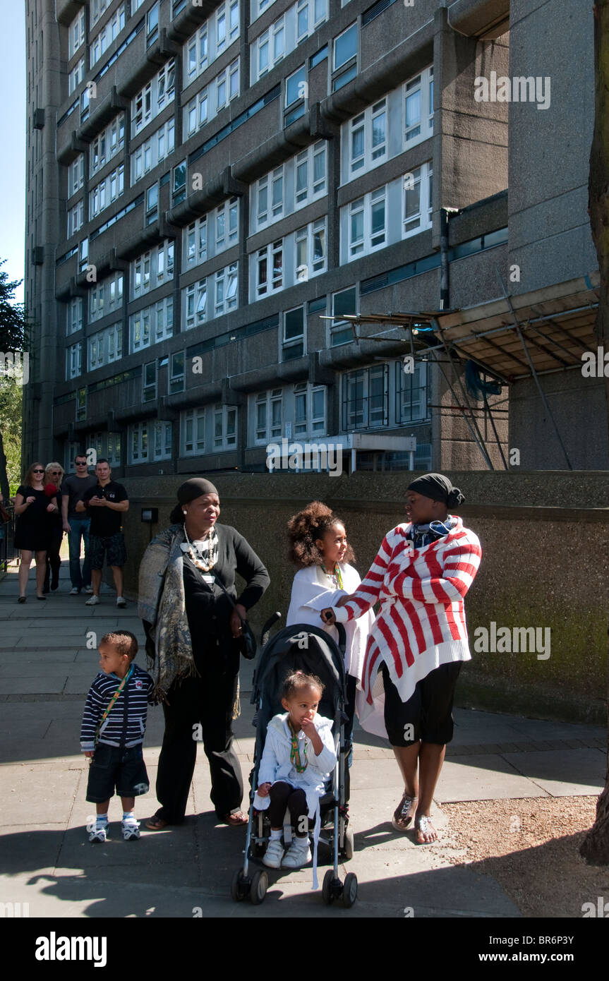 Residents outside tower block in West London Stock Photo - Alamy