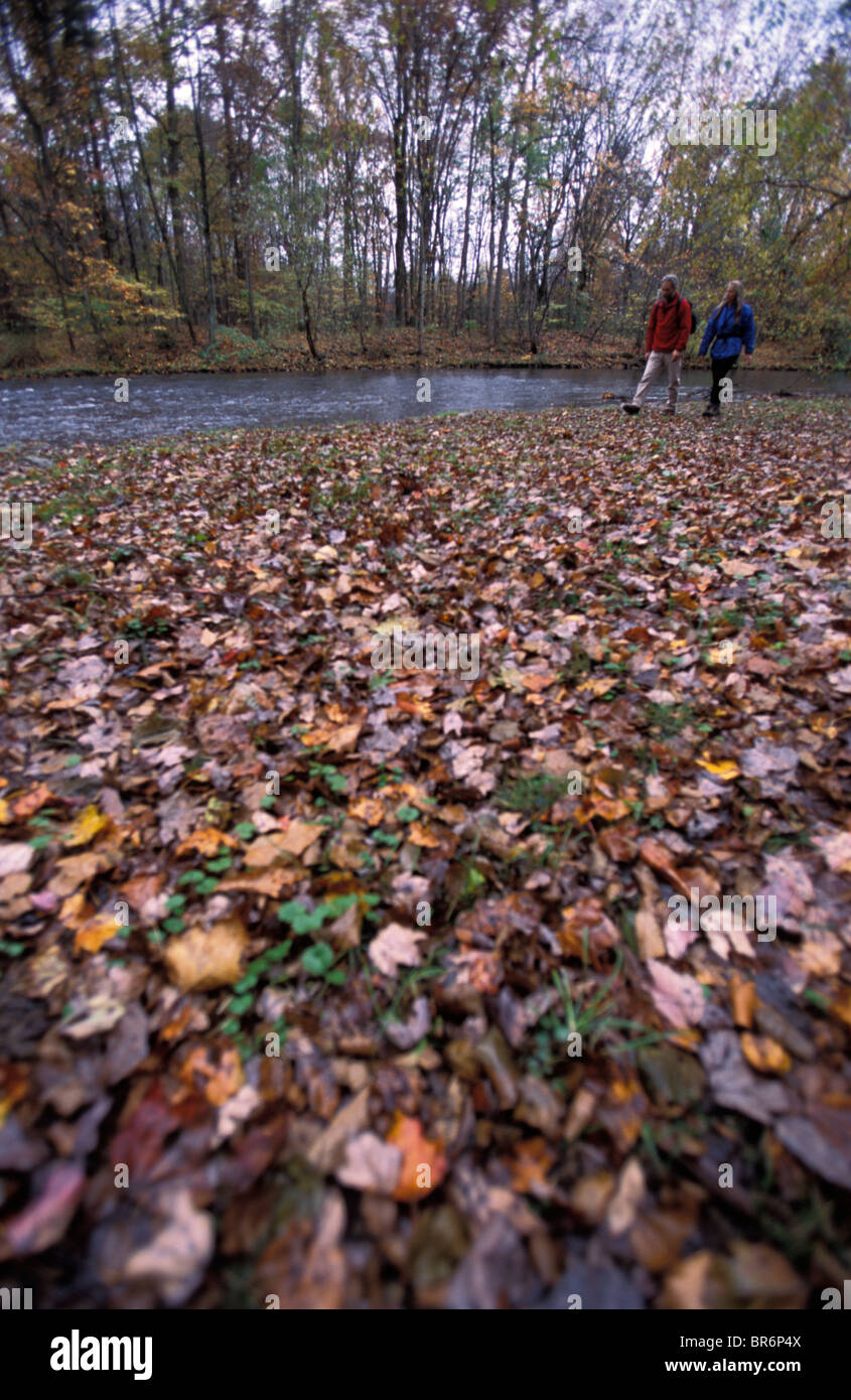 A man and a woman hiking near the Appalachian Trail in the fall Stock ...