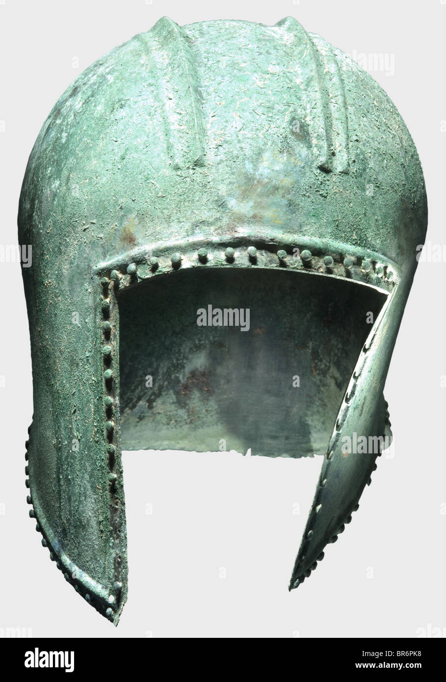 An Illyrian helmet, 6th century BC. Bronze. Spherical skull with a ...