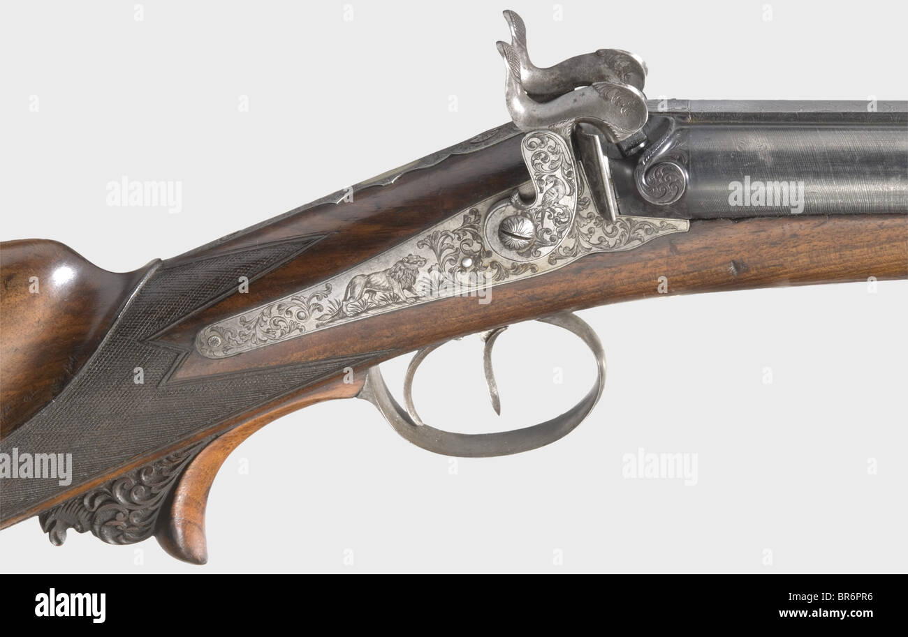 A percussion rifle, Liège(?), circa 1850. Rifled Damascus steel barrels ...