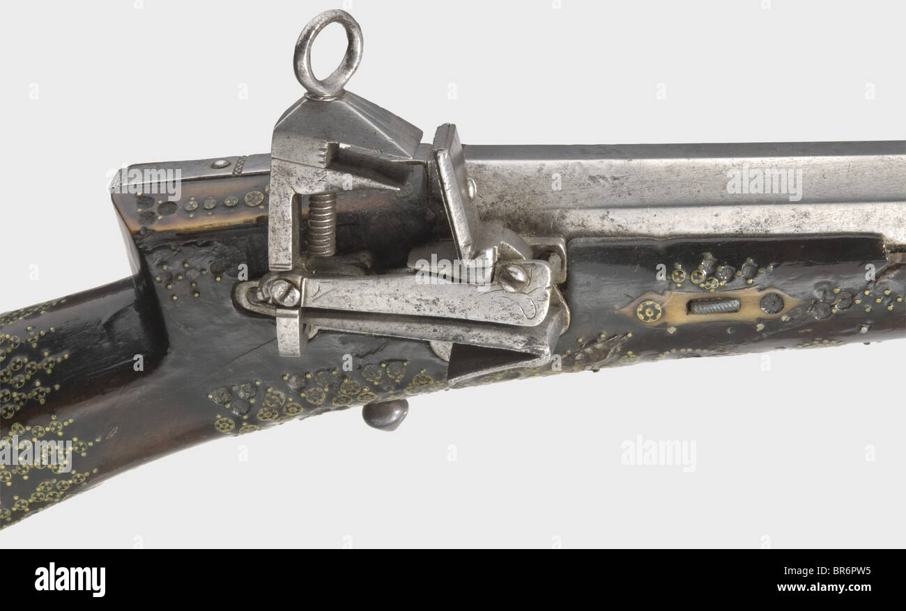 An Ottoman miquelet-lock rifle, circa 1750. Octagonal barrel with ...