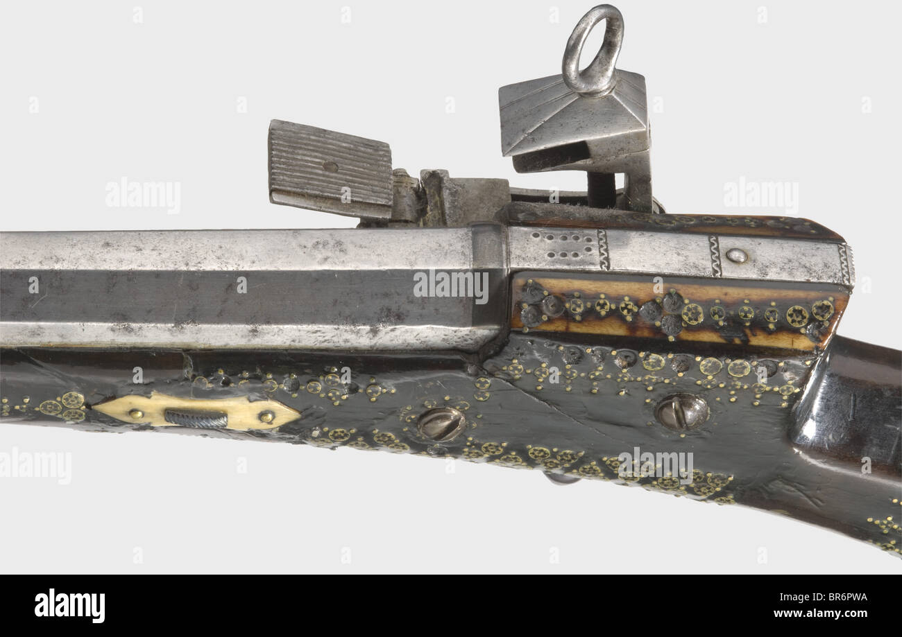 An Ottoman miquelet-lock rifle, circa 1750. Octagonal barrel with ...