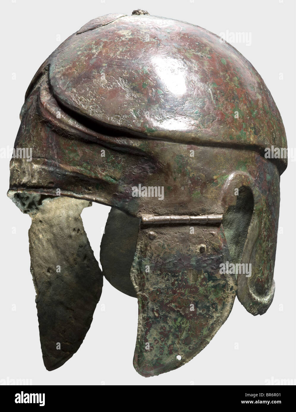 A Chalcidian helmet with cheek pieces, 5th/4th century B.C. Bronze ...