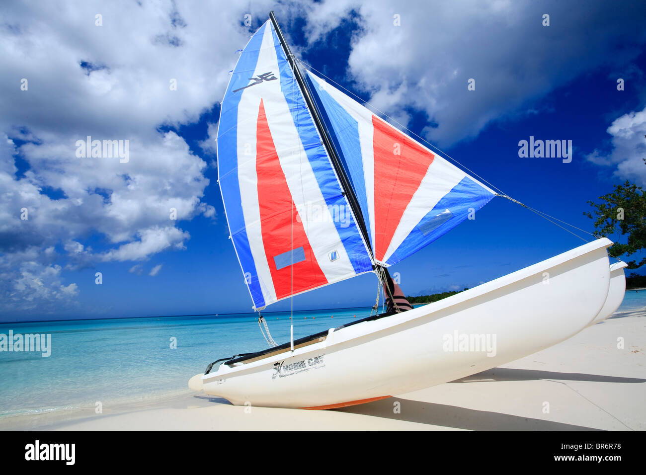 A Catamaran on an exotic beach Stock Photo - Alamy