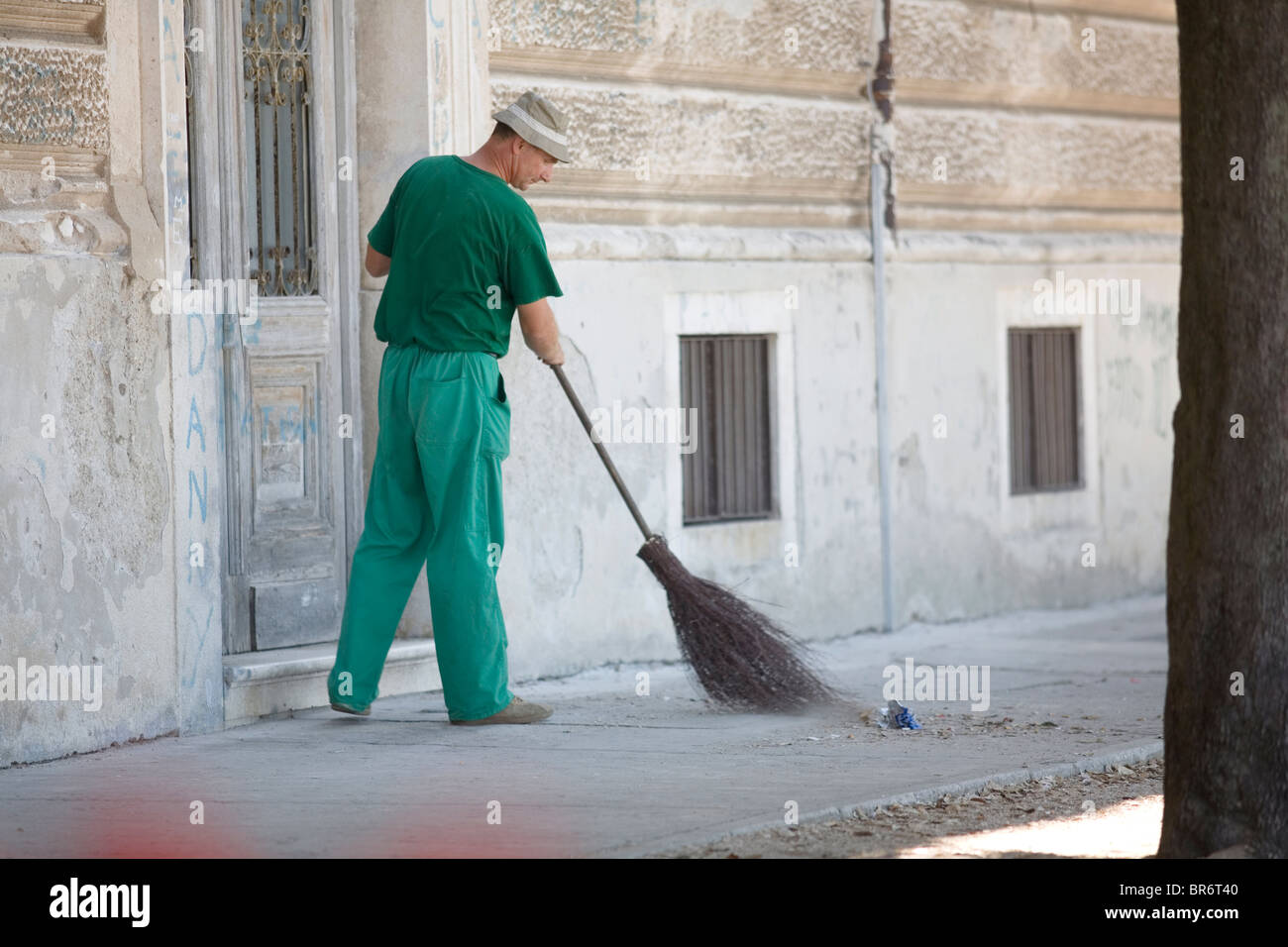 A man sweeping the streets in Zadar Croatia Stock Photo - Alamy