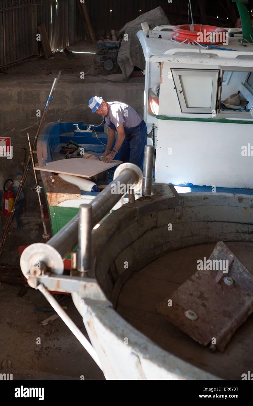 craftsman shipyard worker naval boat vessel ship Formia Italy Stock ...