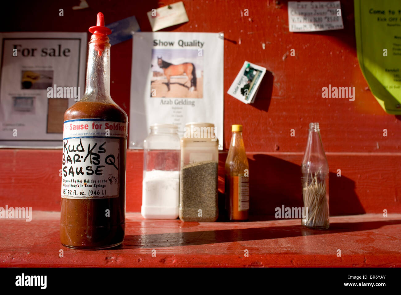 Condiments at a red table with red walls at a restaurant in Leon ...