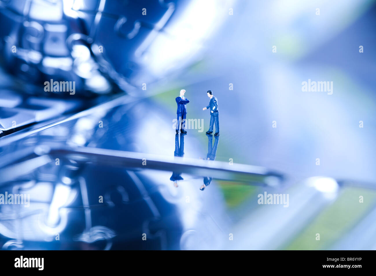 Figure man over computer background Stock Photo - Alamy