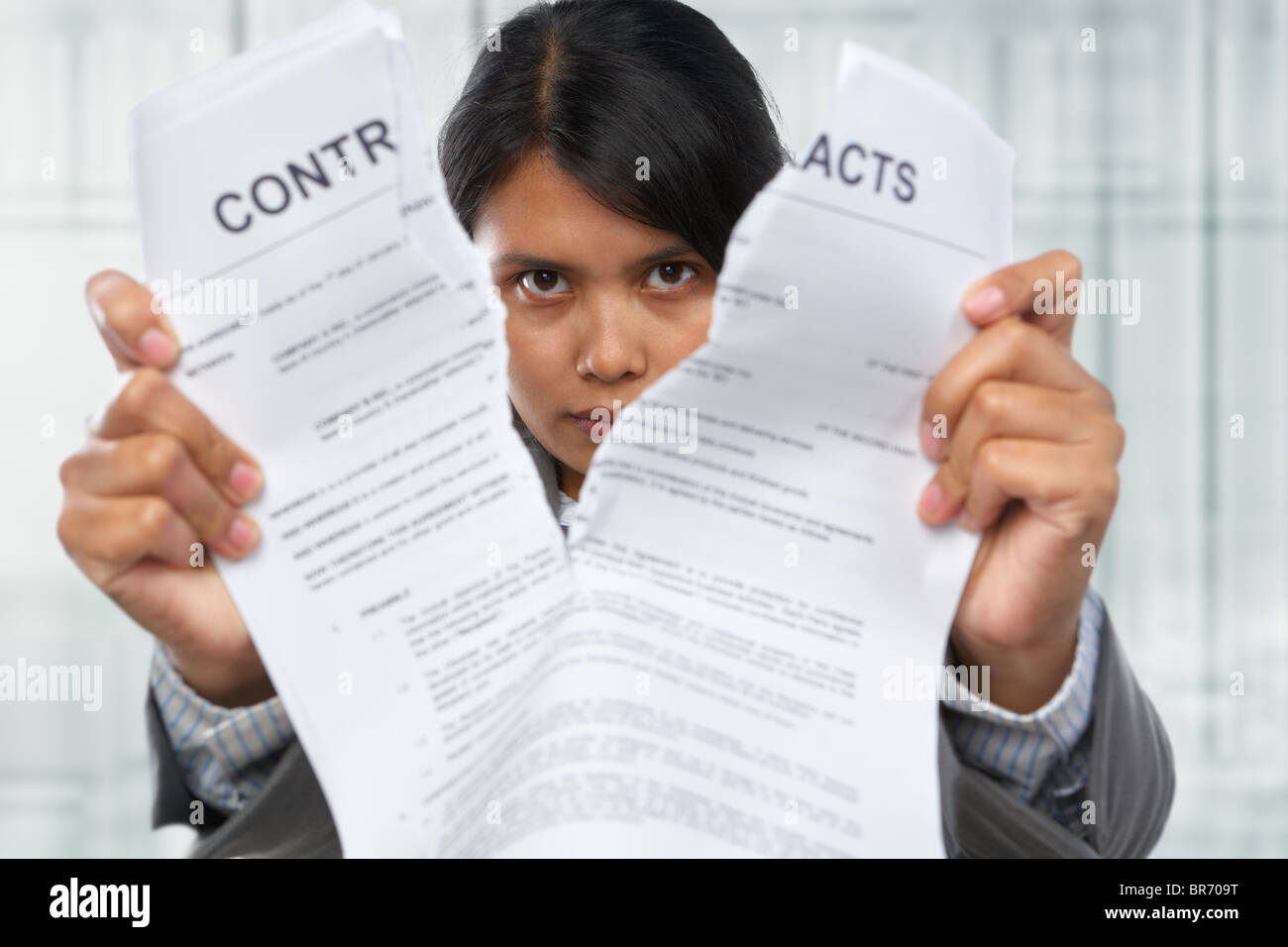 Asian businesswoman tearing up the contract papers Stock Photo - Alamy