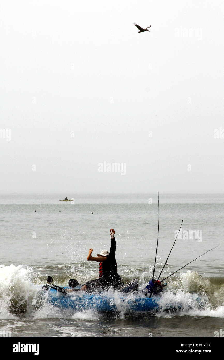 Kayaker being thrown out of his boat Stock Photo - Alamy