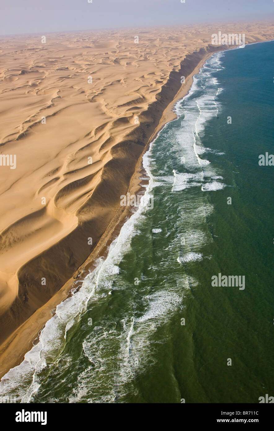 The "Long Wall", aerial view of sand dunes bordering the atlantic coast, near Swakopmund, Namib ...