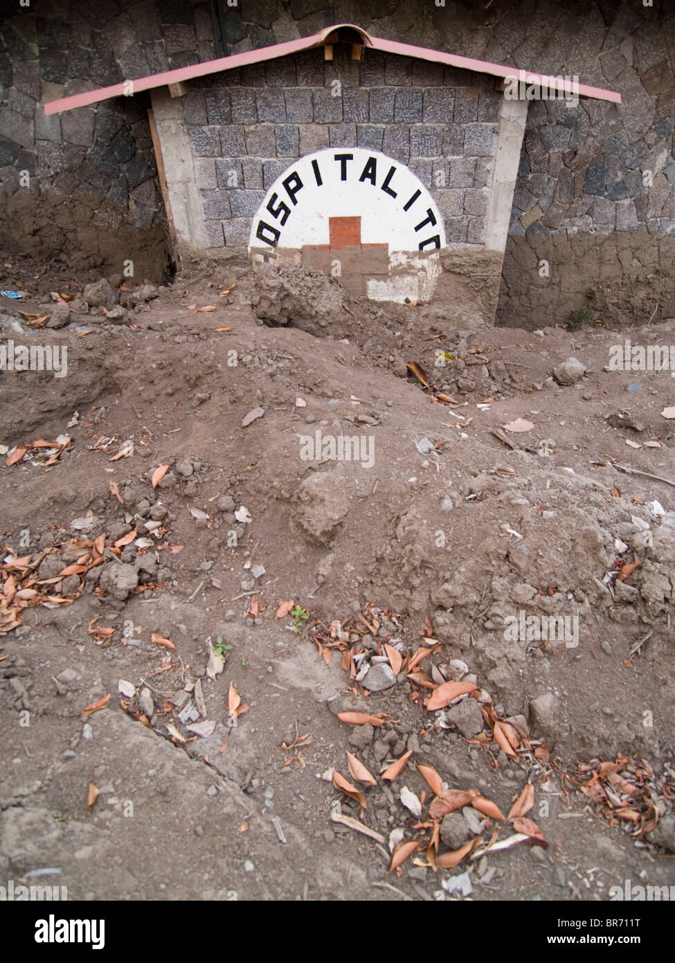 The entrance to a hospital which is encased in mud after a mud slide ...