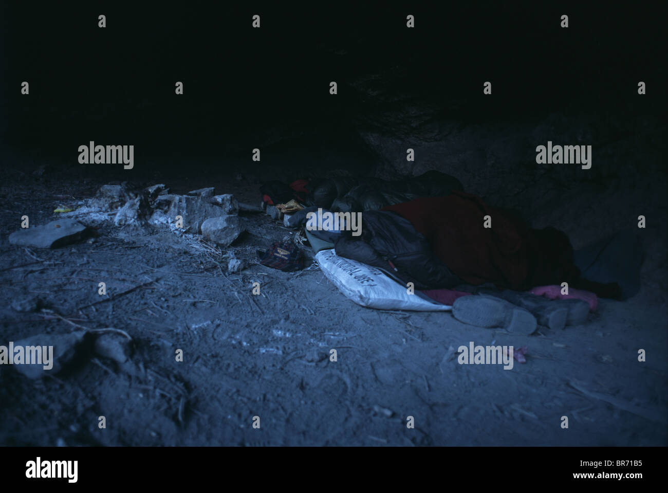 Zanskari men sleeping in cave India Stock Photo - Alamy