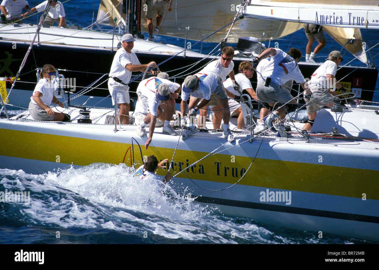 Crewman has fallen overboard on "America Ture" but managed to keep hold ...