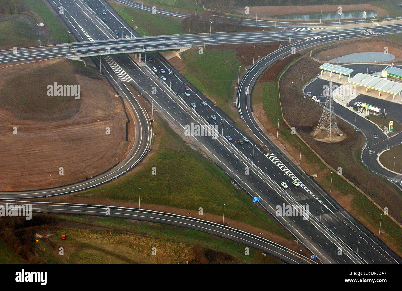The first vehicles travel on the new M6 Toll motorway after the opening ...