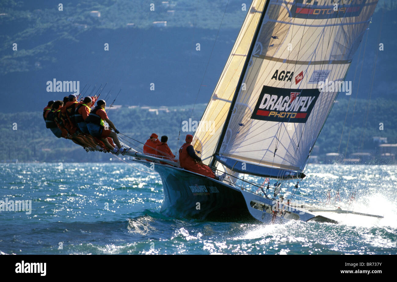 Ten crew on the trapeze of the "Classe Libera" Dragonfly at Centomiglia ...