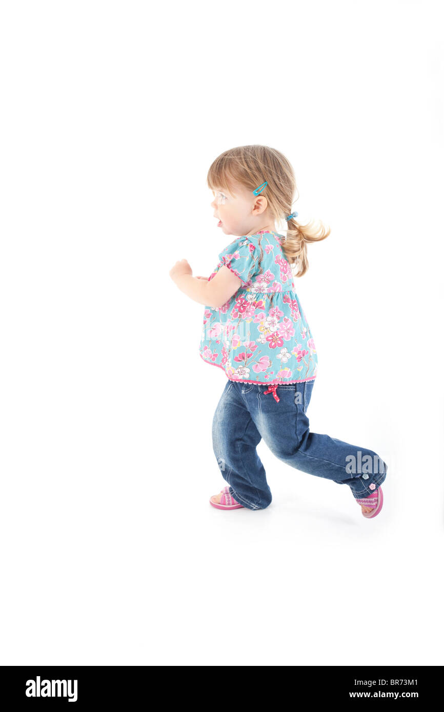 busy little girl running on isolated,white background Stock Photo - Alamy
