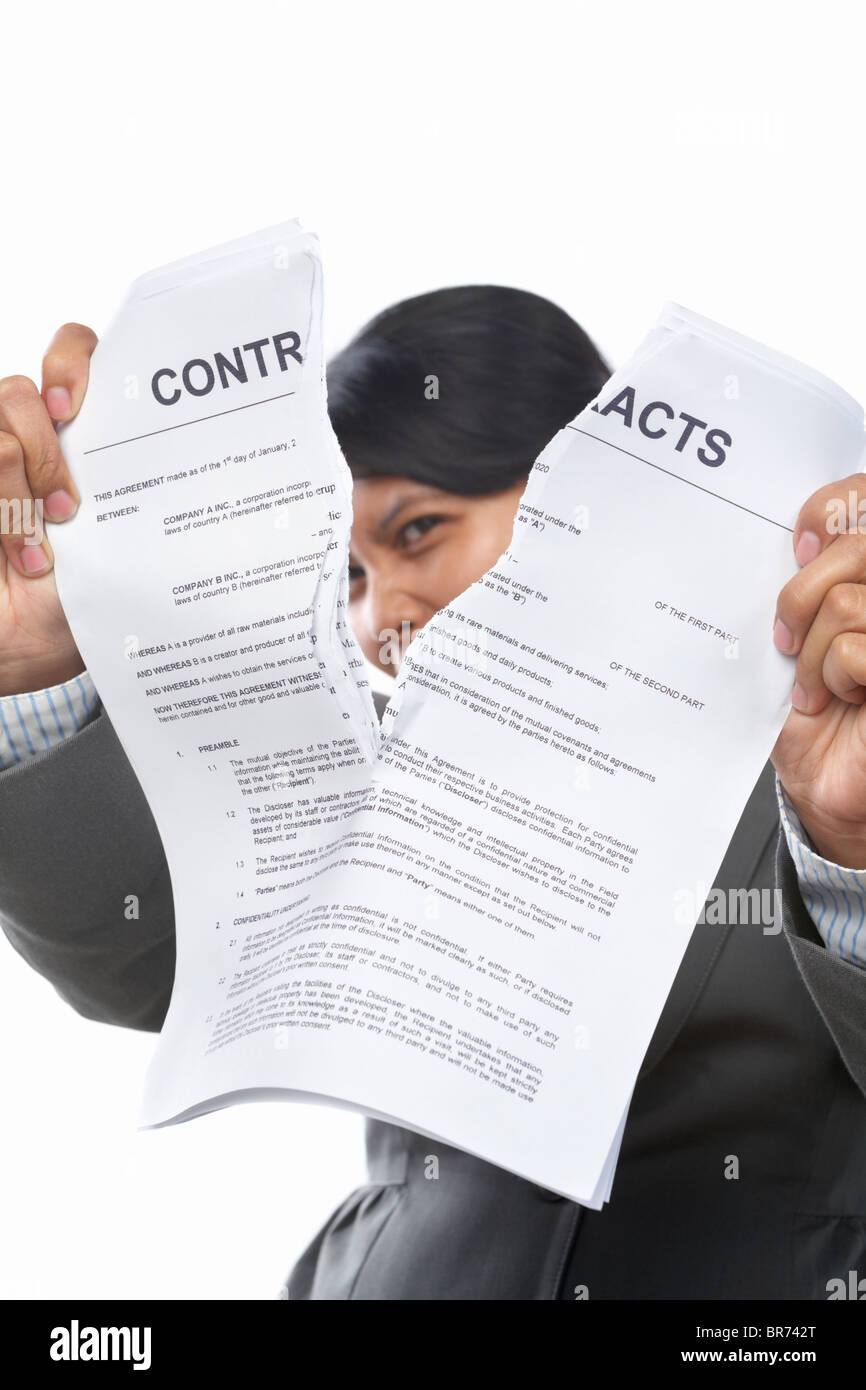 Woman ripping up paper hi-res stock photography and images - Alamy