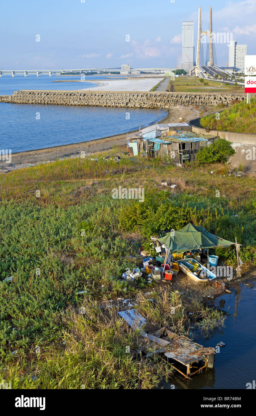 A contrasting view of a typical homeless shack in Japan and the ANA ...