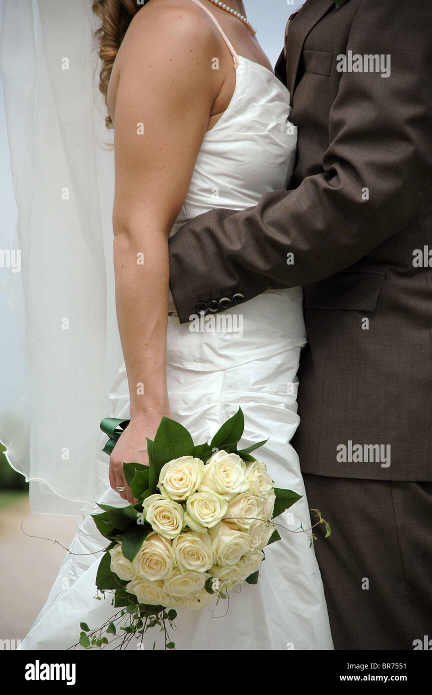 Wedding couple standing very close Stock Photo - Alamy