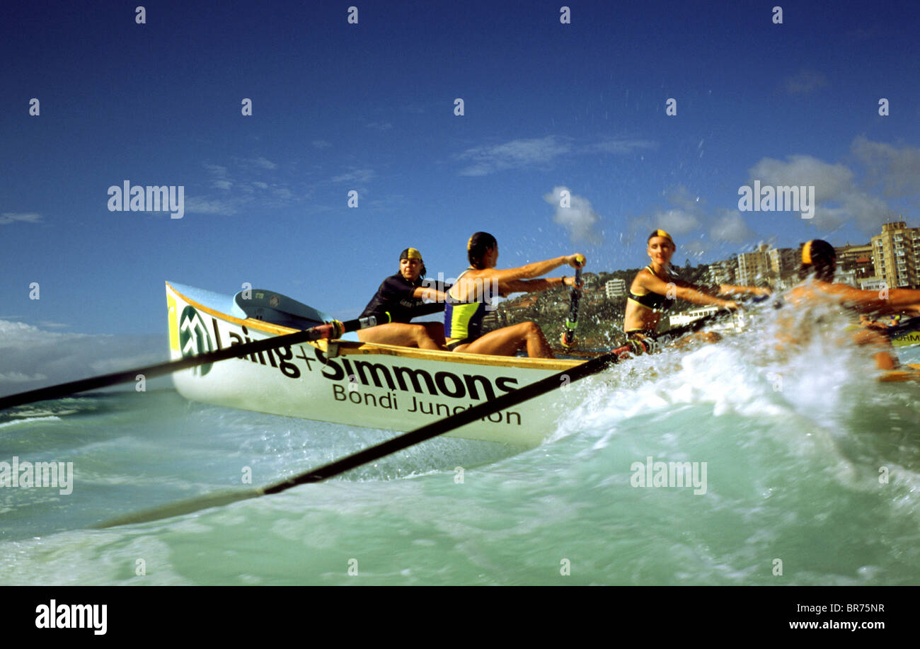 A group of people on a surf boat during a surf carnival in Sydney ...