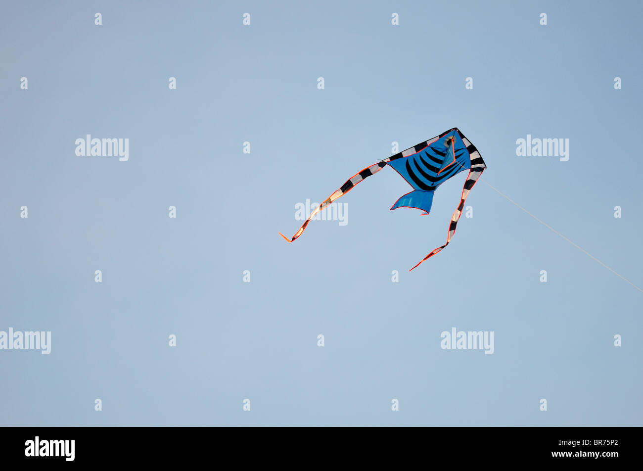 Kit flying in the air over hte East Coast beaches of Singapore Stock ...